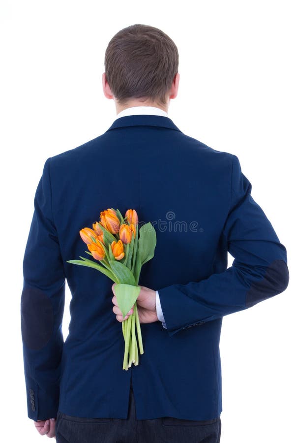 Man Holding Roses Behind His Back Stock Photo - Image of suit, holiday ...