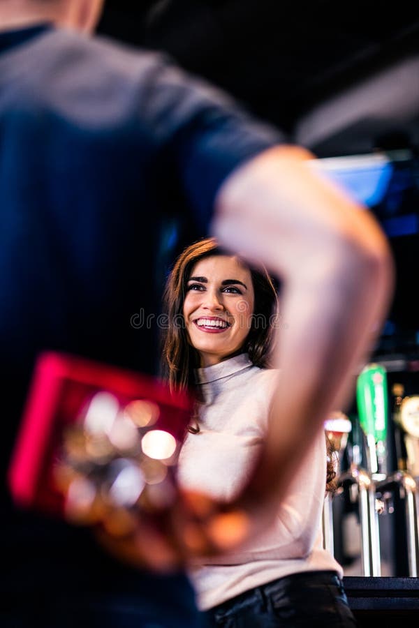 152 Brunette Woman Man Sitting Bar Stock Photos - Free & Royalty-Free ...