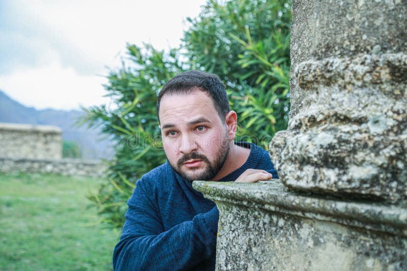 Man Hiding from Someone Searching for Him Stock Photo - Image of ...