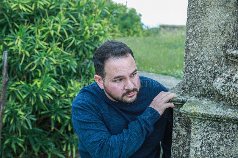 Man Hiding from Someone Searching for Him Stock Photo - Image of male ...