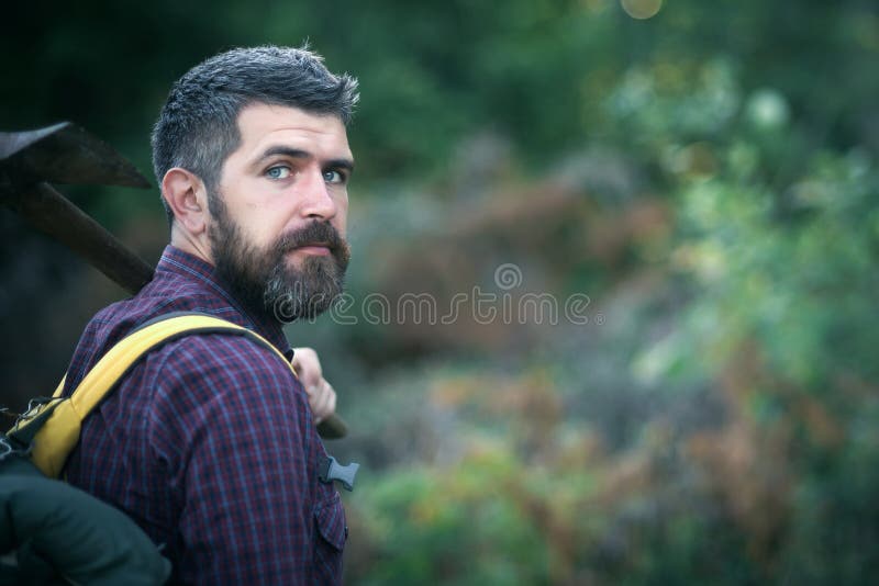 Man Hiker Hold Axe and Backpack on Summer Day on Natural Landscape ...