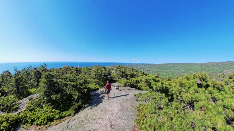 Man Hikes Down Granite Slabs on Champlain Mountain Stock Footage ...