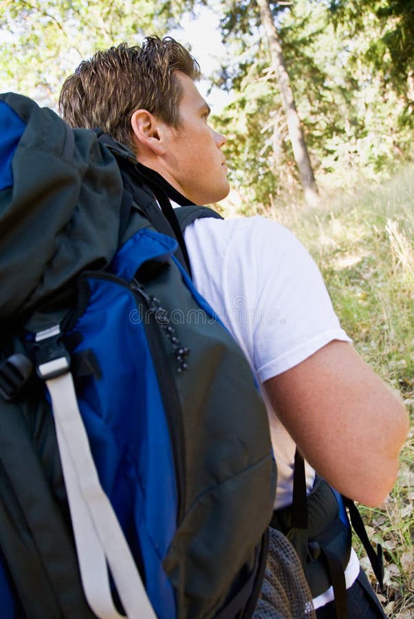 Man hiking with backpack stock image. Image of living - 7329291
