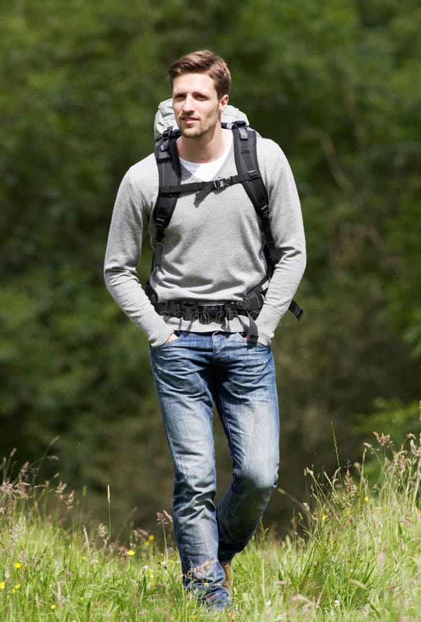 Man Hiking in Countryside stock image. Image of grass - 33075481