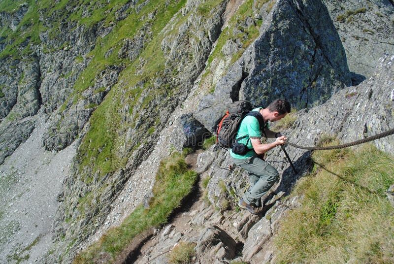 Man Hiking on Difficult Mountain Trail Stock Image - Image of effort ...