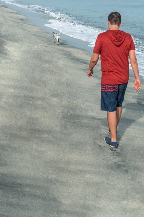 Man on His Back Walking on the Beach on a Summer`s Day Stock Image ...