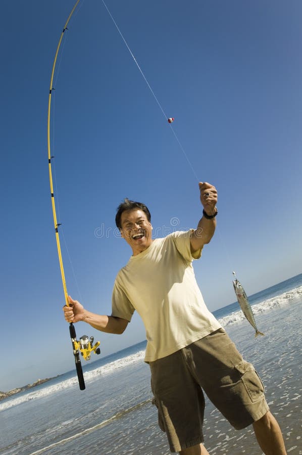 Angler Fisherman Fighting Big Fish Rod and Reel Stock Photo - Image of ...