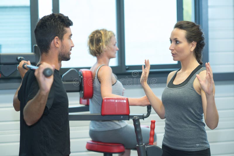 Man and coach in gym stock photo. Image of club, woman - 265994554