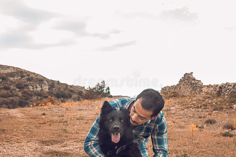 Man with His Dog in the Mountains Stock Image - Image of mountain ...