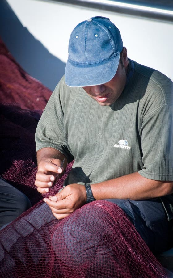 Man and his Fishing Net editorial image. Image of vertical - 17596395