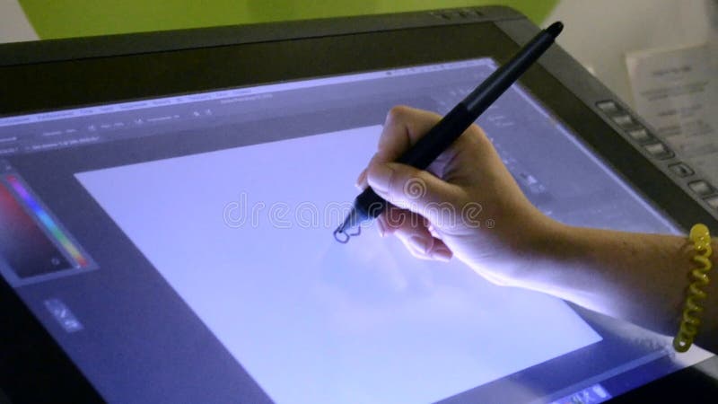 The Man with His Hand with a Special Pencil Drawing on a Large Tablet ...