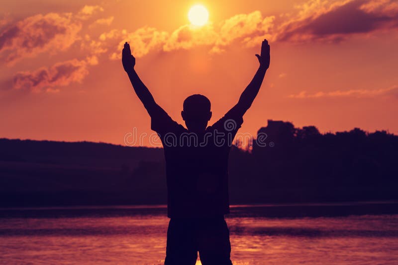 Man with His Hands Up at the Sunset on the Beach Stock Image - Image of ...