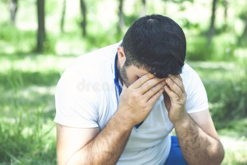 Man with His Head in His Hands. Concept of Sadness or Depression. Stock ...