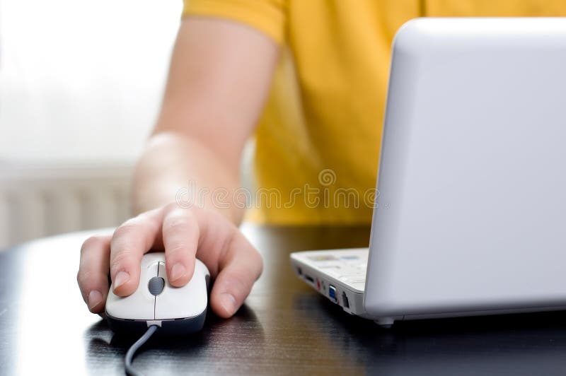 Man with His Right Hand on the Mouse Stock Photo - Image of notebook ...
