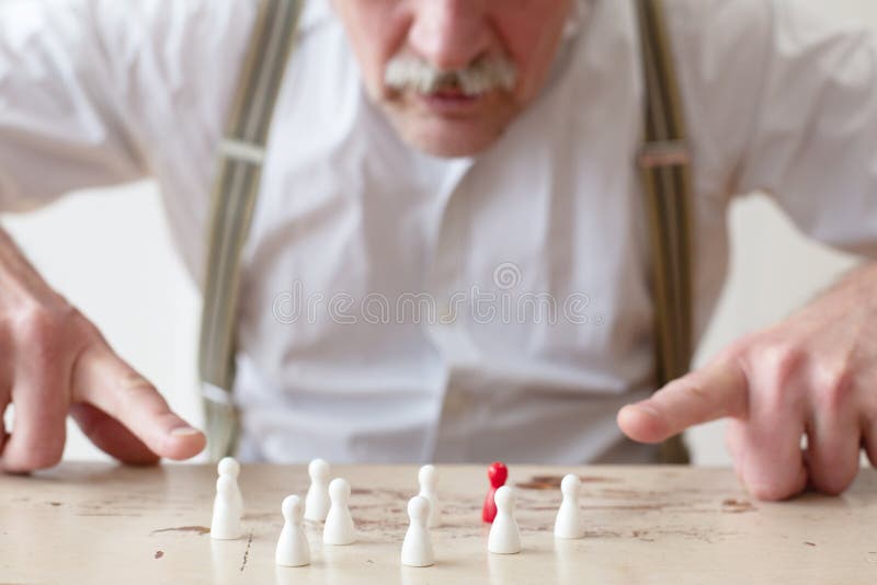 Man in His 50s Pointing at Game Pieces Stock Photo - Image of ...