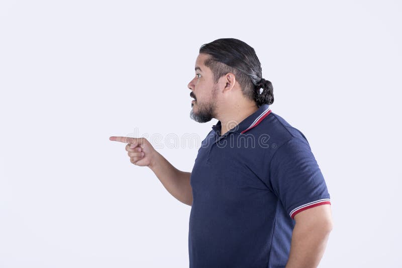 A Man in His 30s Points the Finger at Someone. Putting the Blame at ...
