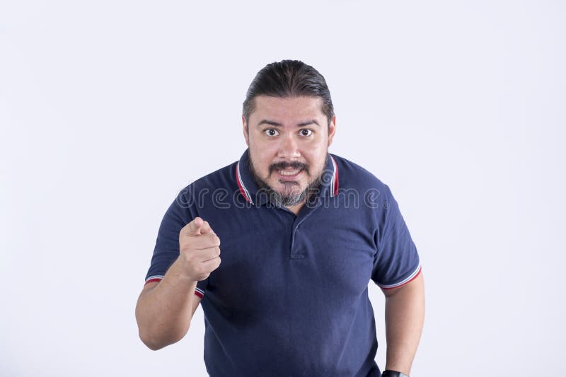 A Man in His 30s Reprimanding Someone, Pointing with His Finger ...