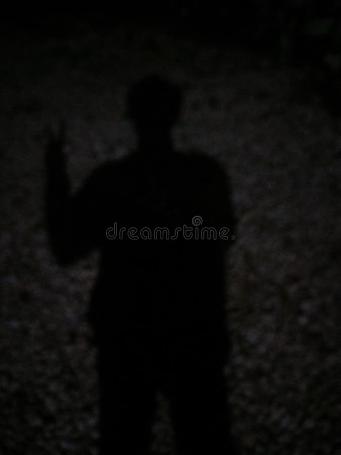 The man with his shadow stock photo. Image of shadow - 264090162