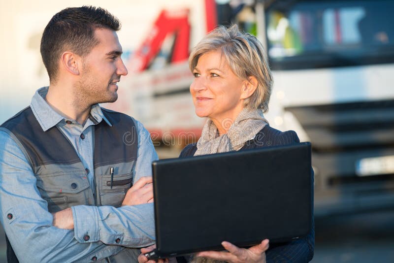 Man with Woman Partner Looking Project on Laptop Stock Image - Image of ...
