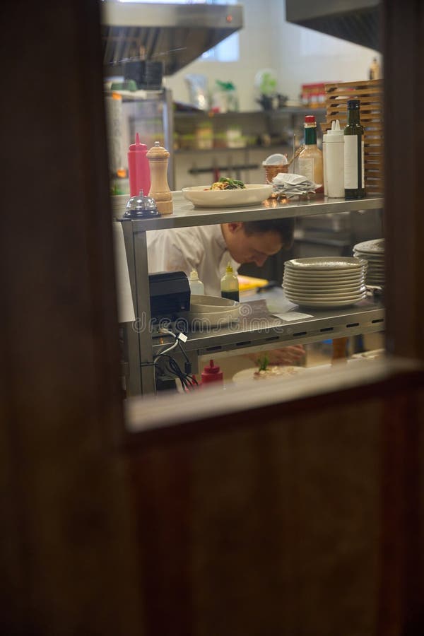 Man is at His Workplace in a Restaurant Kitchen Stock Image - Image of ...