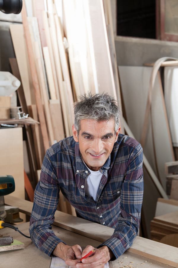 Man in his workshop stock image. Image of professional - 65260441