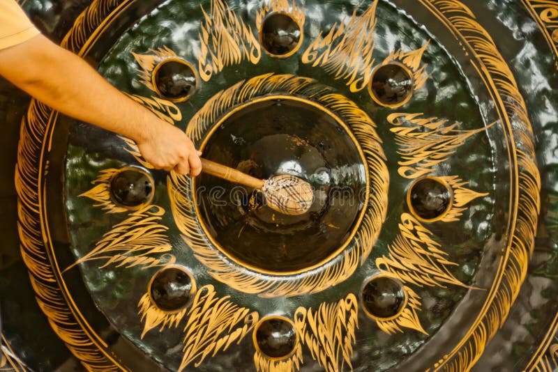 A man hit big gong stock photo. Image of prayer, gong - 20845434
