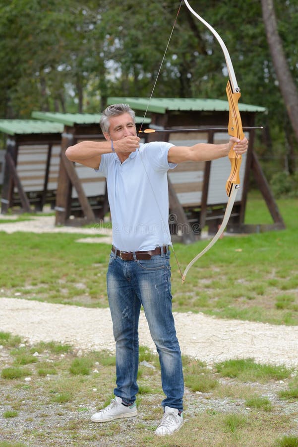 Man hitting target stock photo. Image of archery, pull - 285318090