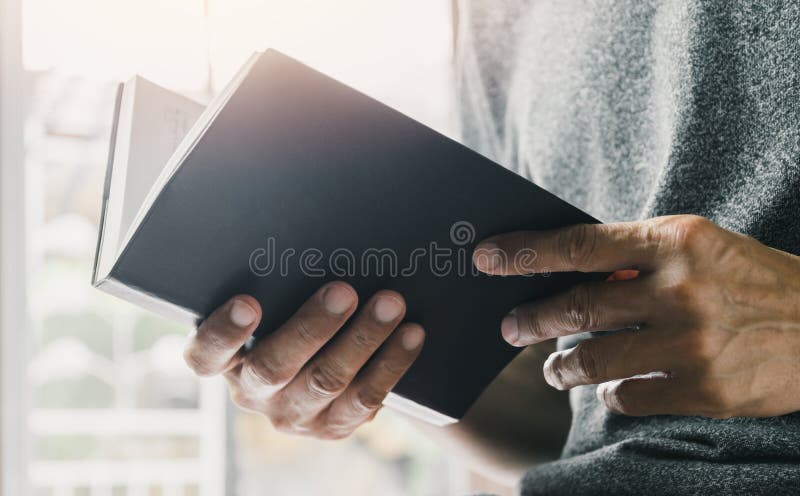 Man Hold a Book for Reading To Get Knowledge Stock Photo - Image of ...