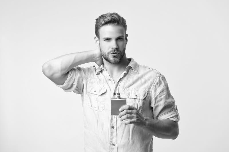 Man Hold Cologne. Man Hold Cologne Isolated on Yellow. Man Hold Cologne ...