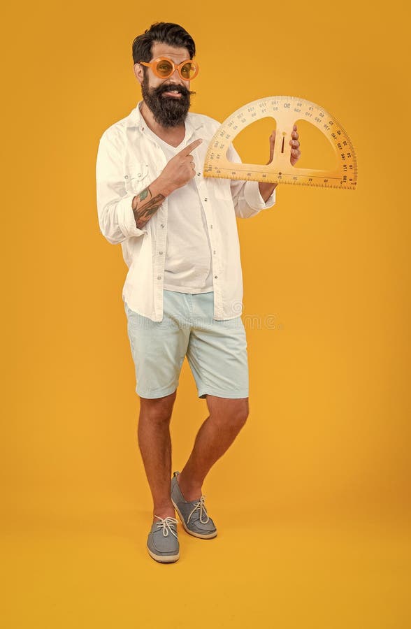 Man Hold Geometry Protractor Isolated on Yellow. Man Hold Geometry ...