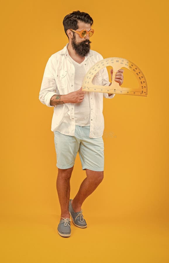 Man Hold Geometry Protractor Isolated on Yellow. Man Hold Geometry ...