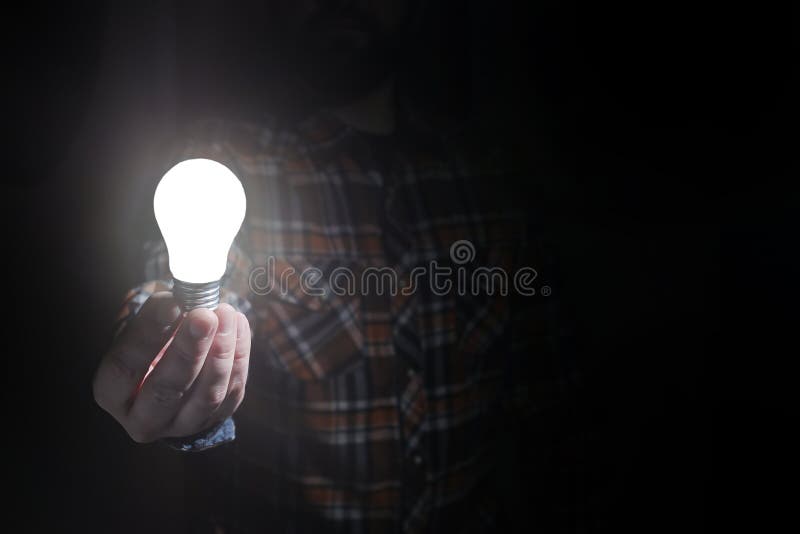 Man hold glow lamp in hand stock photo. Image of creative - 89482832