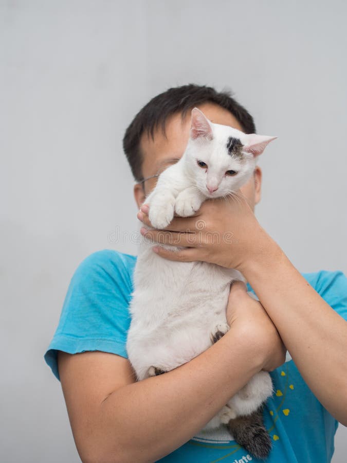Man Hold His Cat Up Stock Photos - Free & Royalty-Free Stock Photos ...