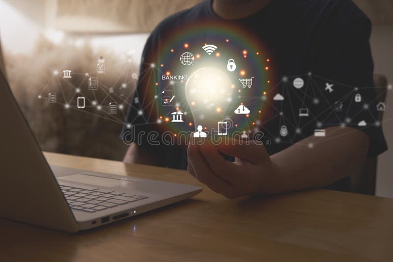 Man Hold Light Bulb Lamp Graphic while Use Laptop Computer in Idea ...