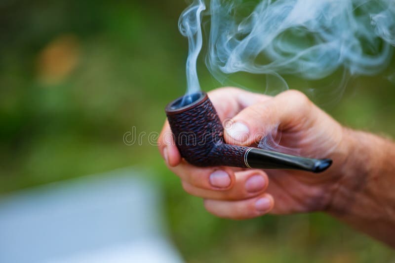 Man Hold Smoking Pipe in a Hand Stock Photo - Image of calm, coils ...