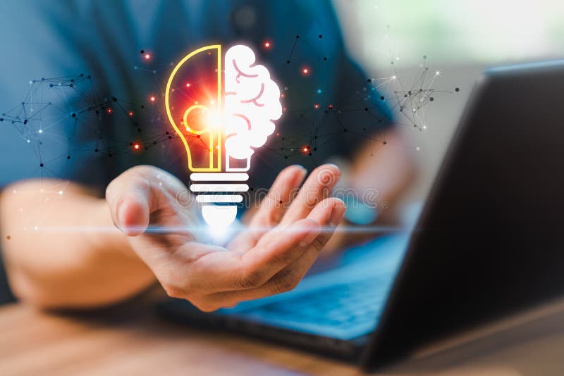 Man Holding Abstract Light Bulb Icon while Working on Computer Thinking ...