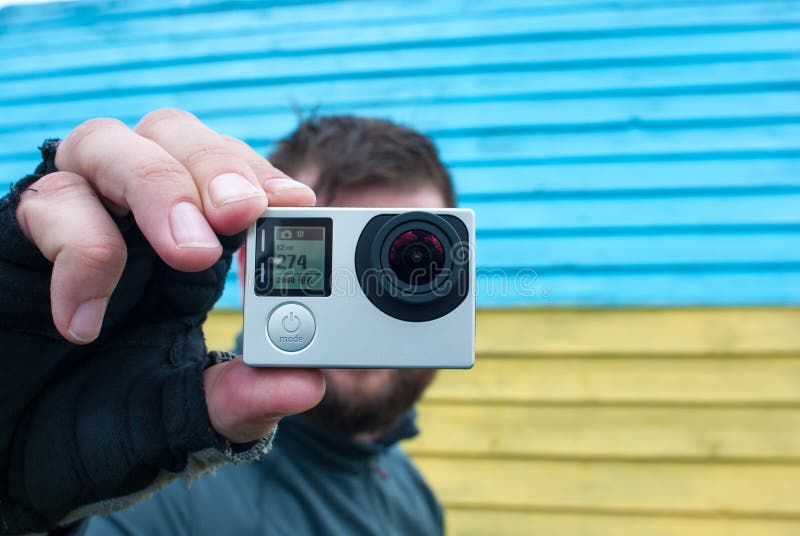 Man Holding Action Camera. the Colors of Ukrainian Flag Stock Image ...