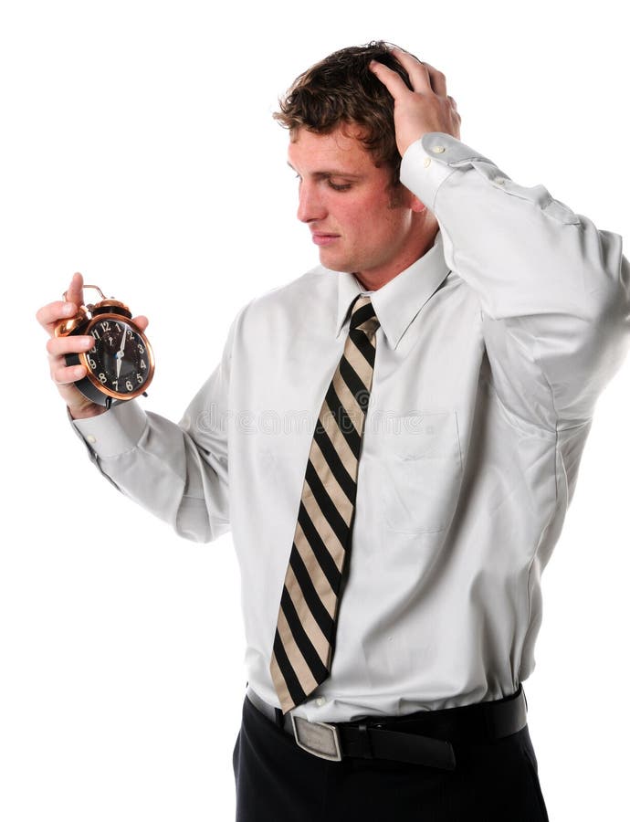 Man Holding an Alarm Clock stock photo. Image of time - 7198296