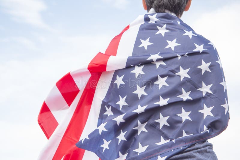Man Holding American Flag with Blue Sky Editorial Stock Image - Image ...