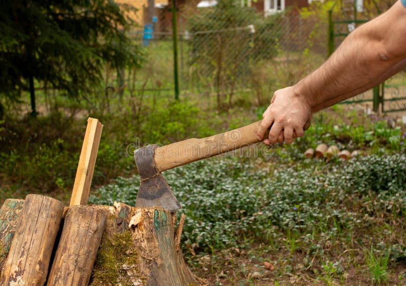 Man Holding Axe in Bare Hands Stock Photo - Image of cuntryside ...