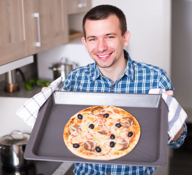 Man Holding Baking Sheet with Pizza Stock Image - Image of ingredient ...