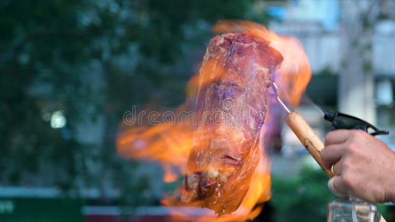 Man Holding Barbecue with Fire on Background, Outdoors Stock Footage ...