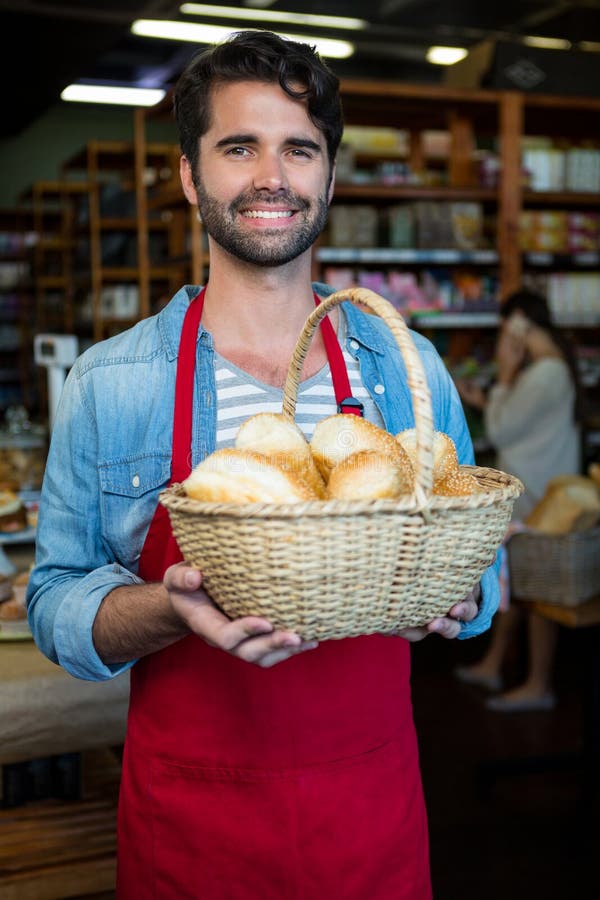 Man Holding Basket of Bread Stock Photo - Image of handsome, nutrition ...