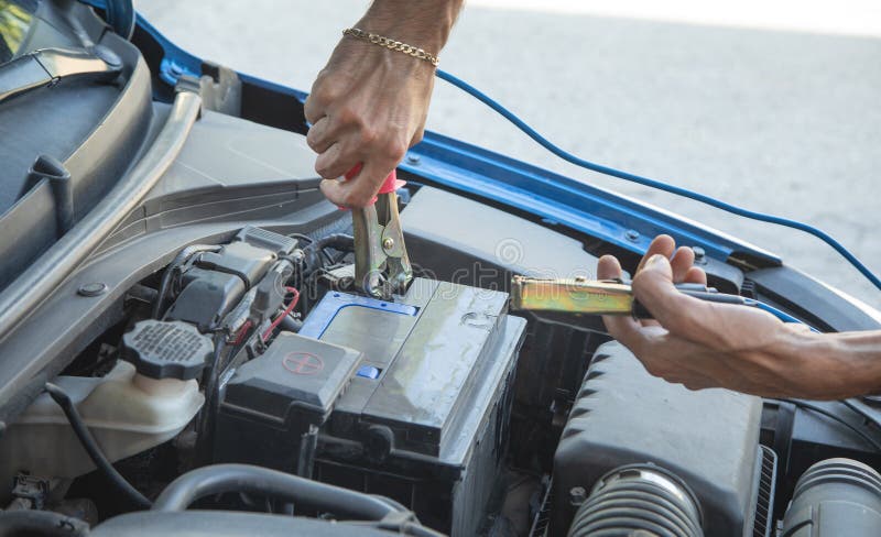 Man Holding Battery Cable for Charging the Car Stock Image - Image of ...
