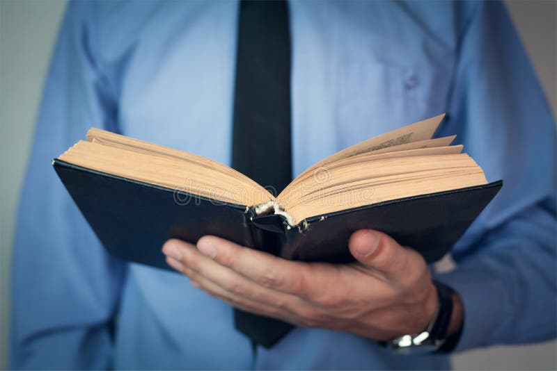 Man holding bible. stock photo. Image of reading, bible - 112567992