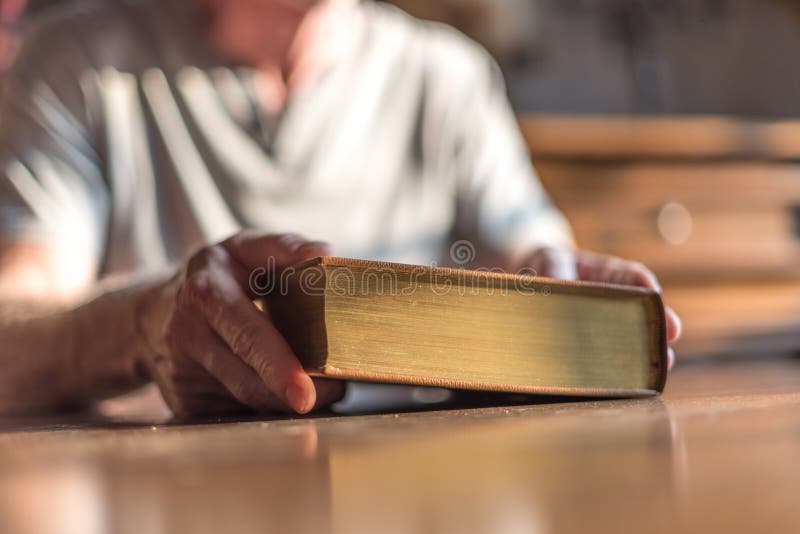 Man holding the Bible stock image. Image of knowledge - 59070577
