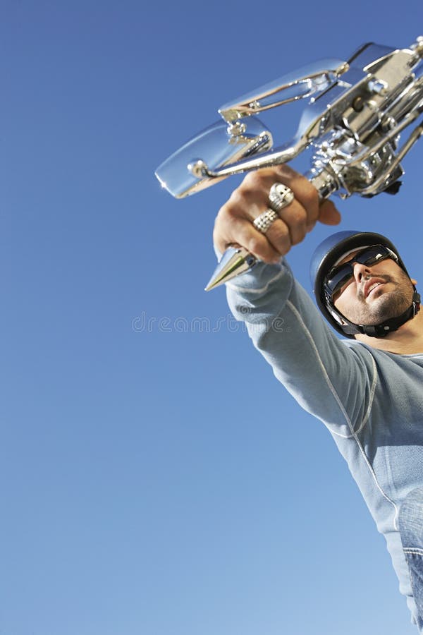 Man Holding Bike Accelerator Stock Photo - Image of latin, bike: 29658714