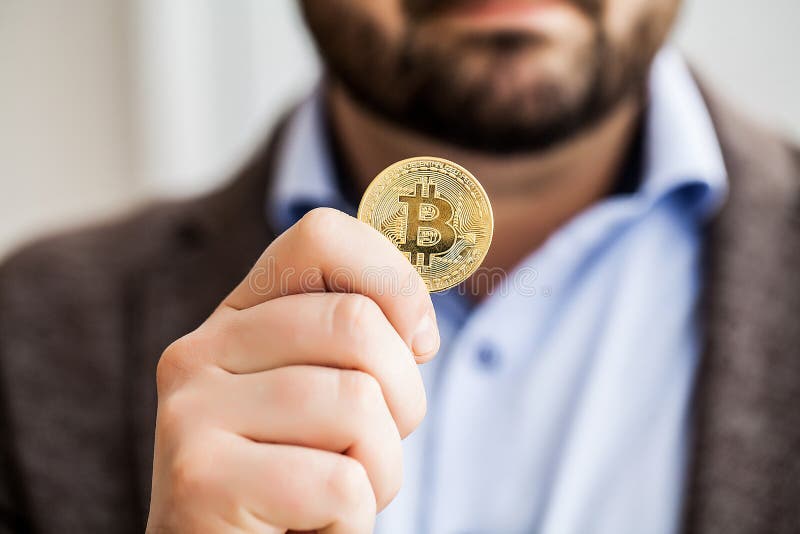 The Man is Holding Bitcoins in His Office Stock Photo - Image of ...