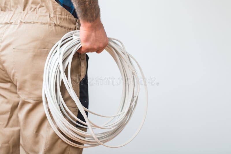 Man holding the cable stock image. Image of installing - 183758537