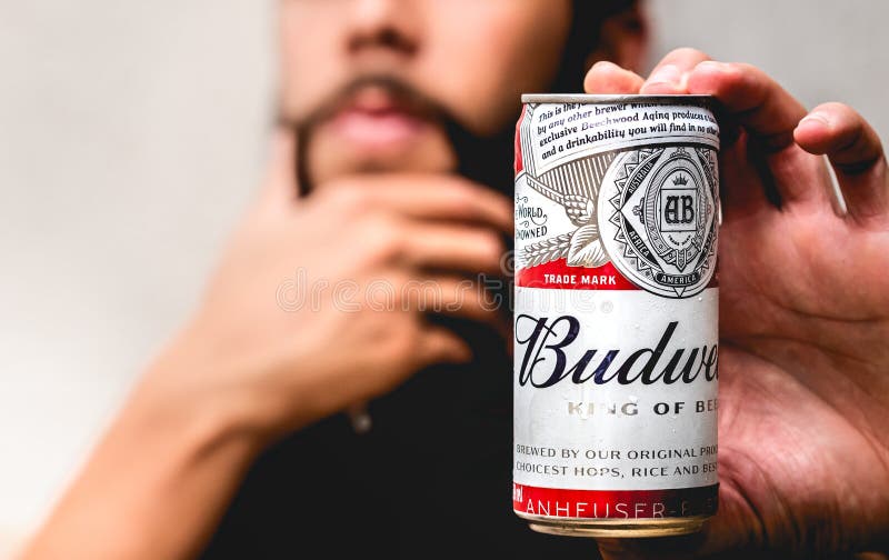 Shot of a Man Holding a Bottle of Budweiser Beer. Editorial Photography ...